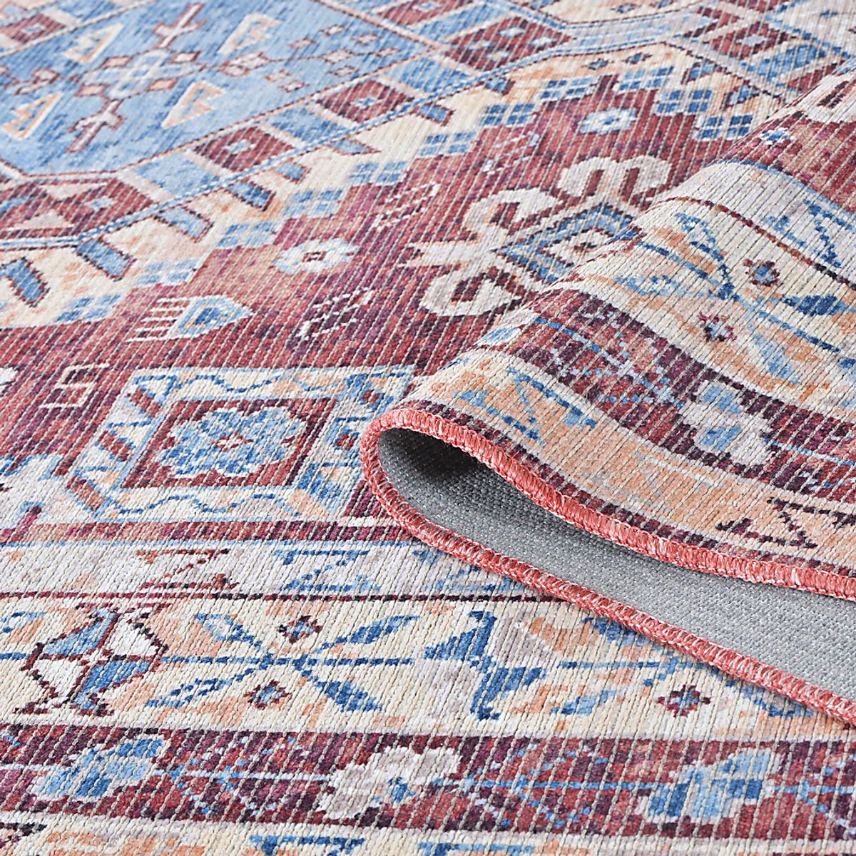Aebby Red Polyester Fabric Rug | Rooms to Go