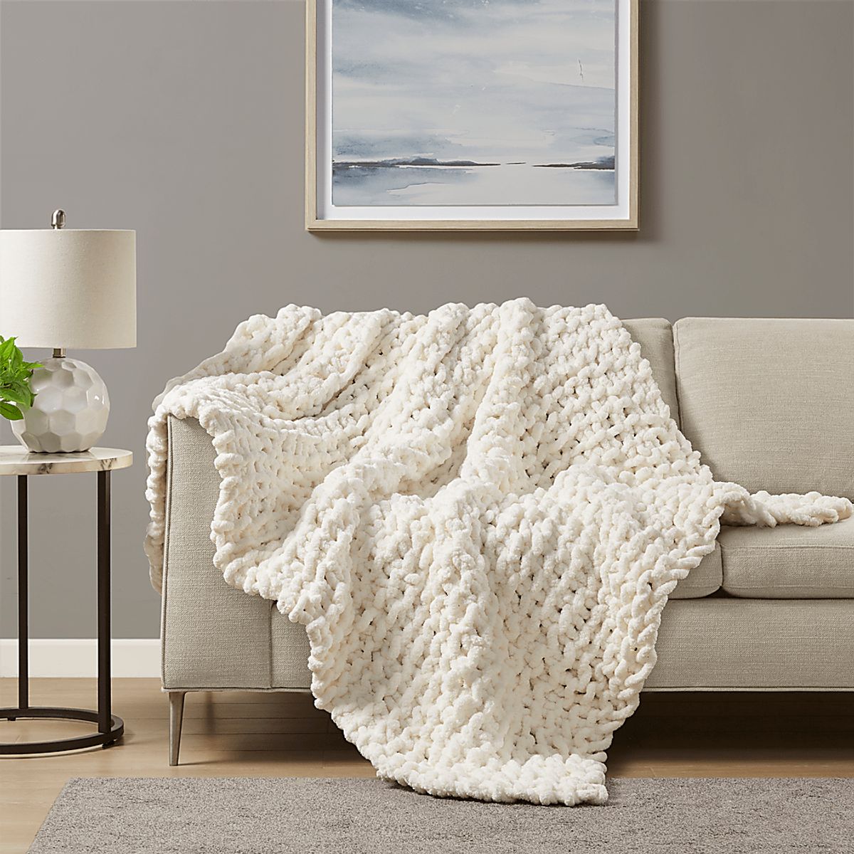Altstatten Ivory Beige Polyester Fabric Throw Blanket | Rooms to Go