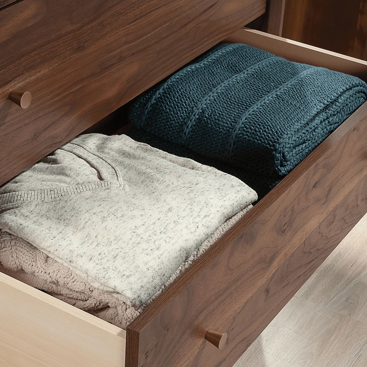Alvaniece Dark Wood Sangria Brown Chest | Rooms to Go