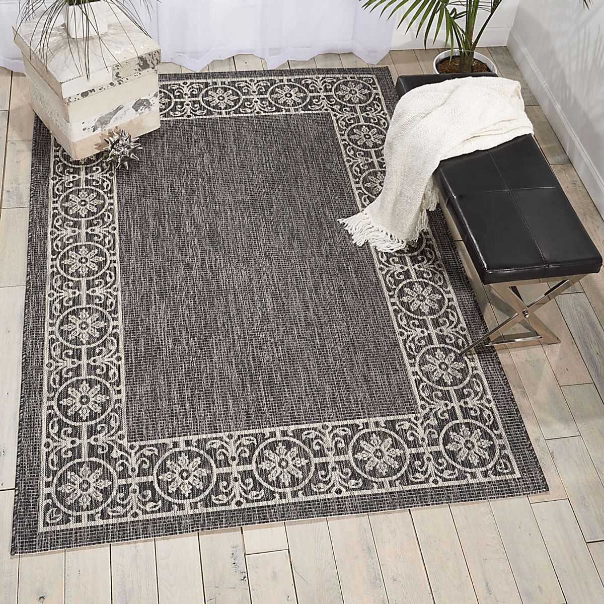 Anvita Charcoal Black,Gray Outdoor Rug | Rooms to Go