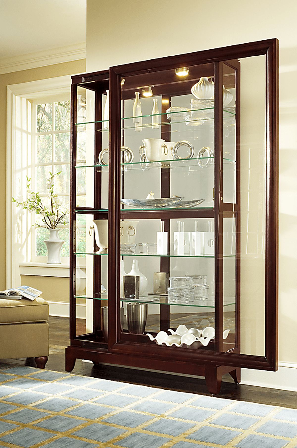 Aurtan Brown Dark Wood Curio Cabinet | Rooms to Go