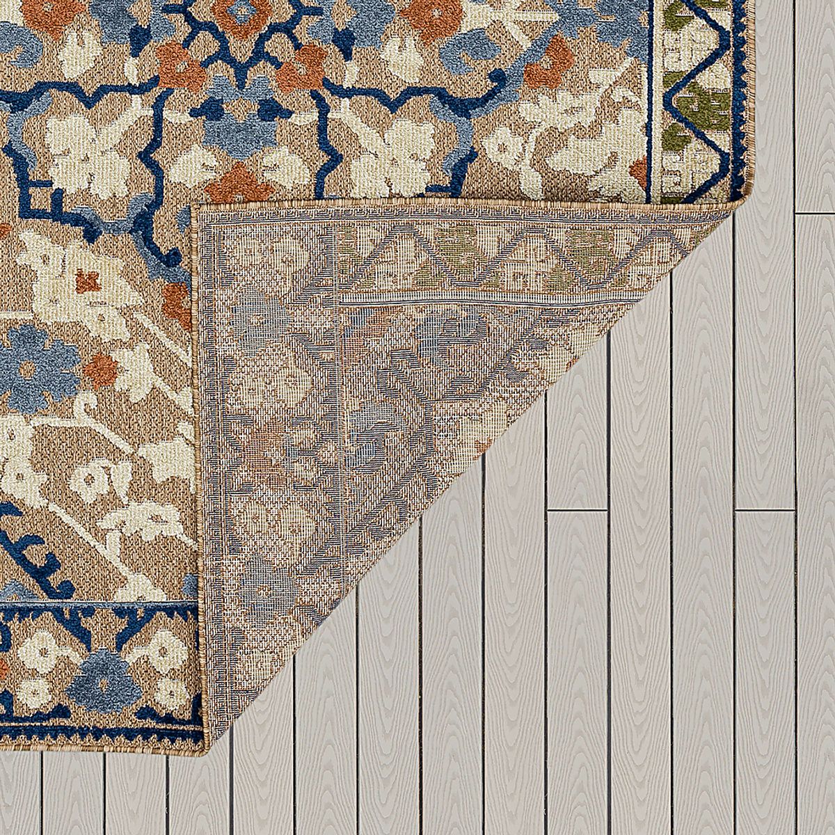 Bannia Bay Beige,Blue,Rust Beige,Blue,Red Outdoor Rugs | Rooms to Go