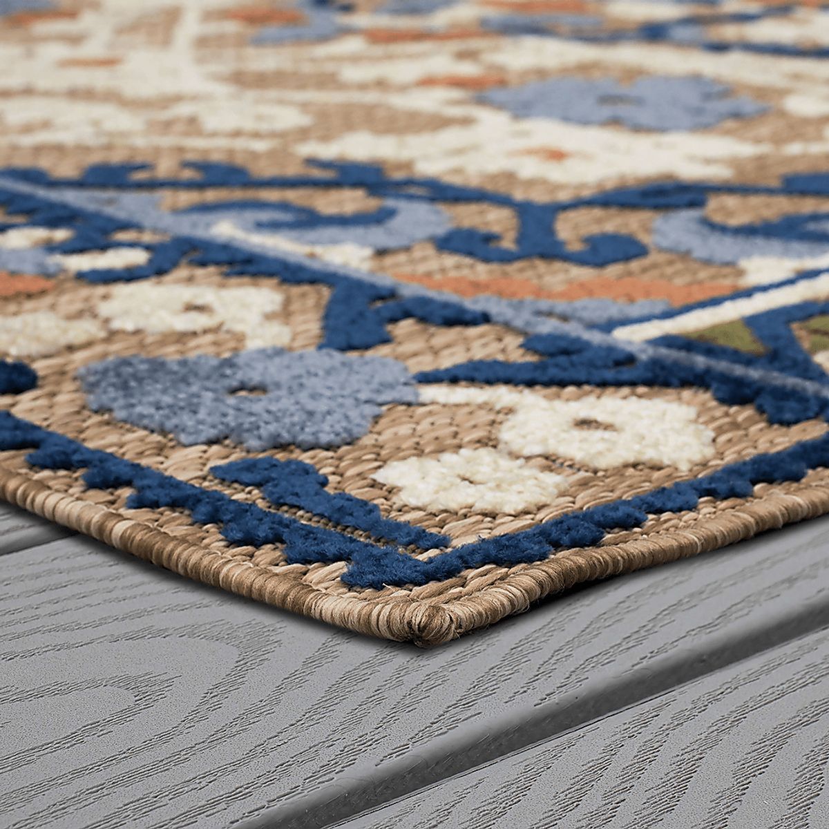 Bannia Bay Beige,Blue,Rust Beige,Blue,Red Outdoor Rugs | Rooms to Go