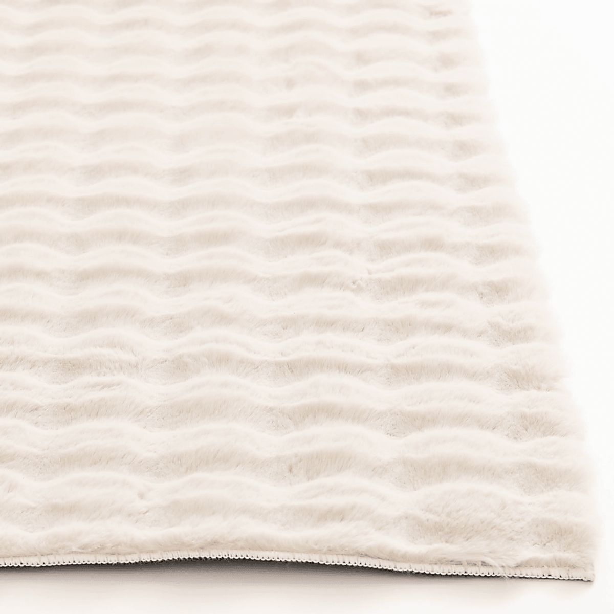 Bubble Minky Ivory Beige Polyester Fabric Rug | Rooms to Go