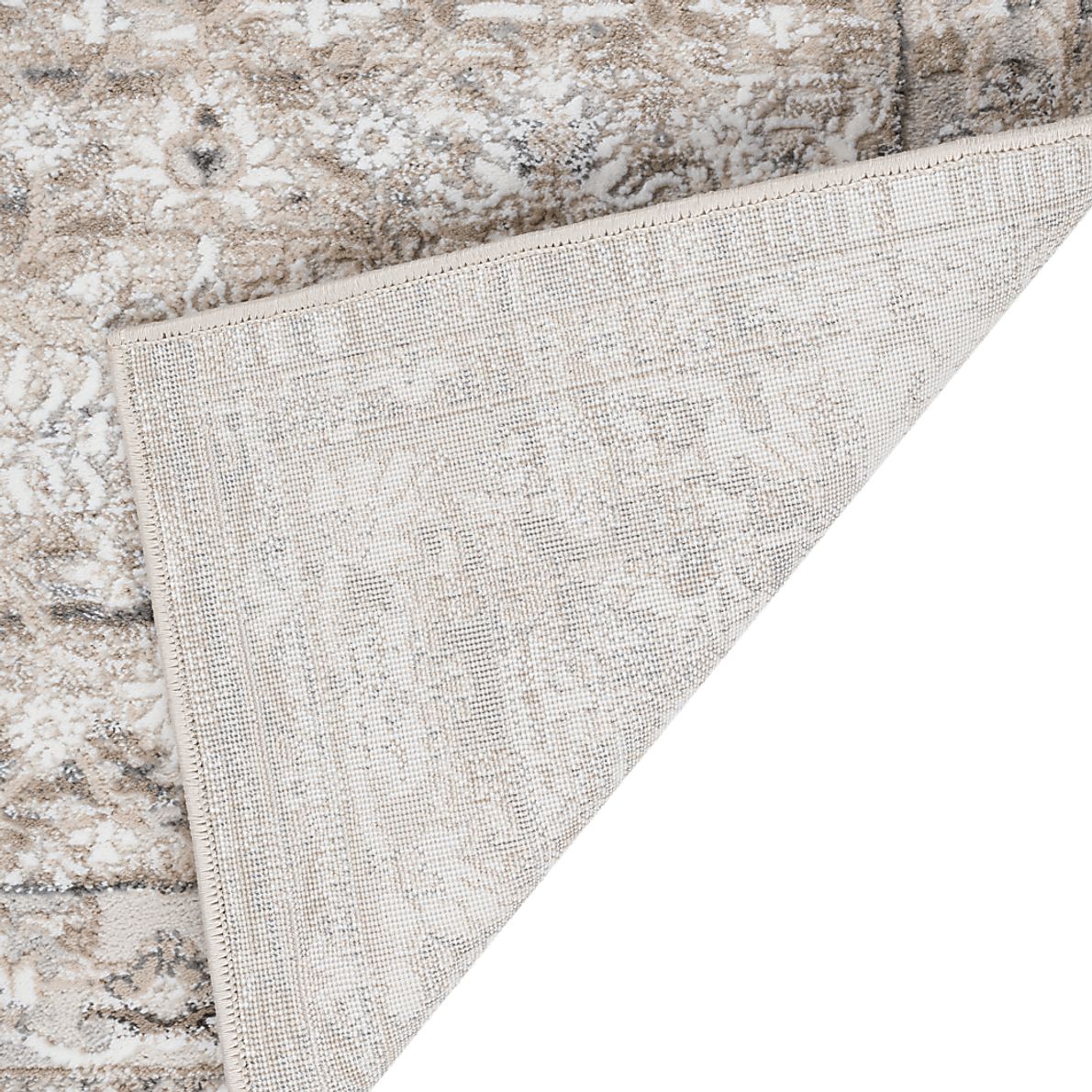Charneta Beige 3' x 5' Rug - Rooms To Go