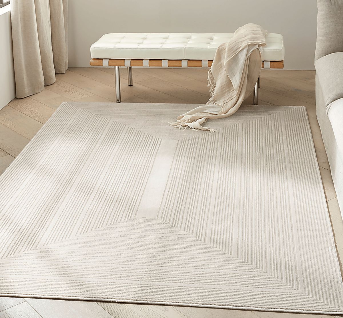 Chauncey Ivory Beige Polypropylene Fabric Rug | Rooms to Go