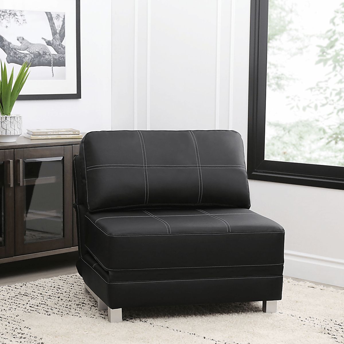 Cheever Black Polyurethane Fabric Futon Chair | Rooms to Go