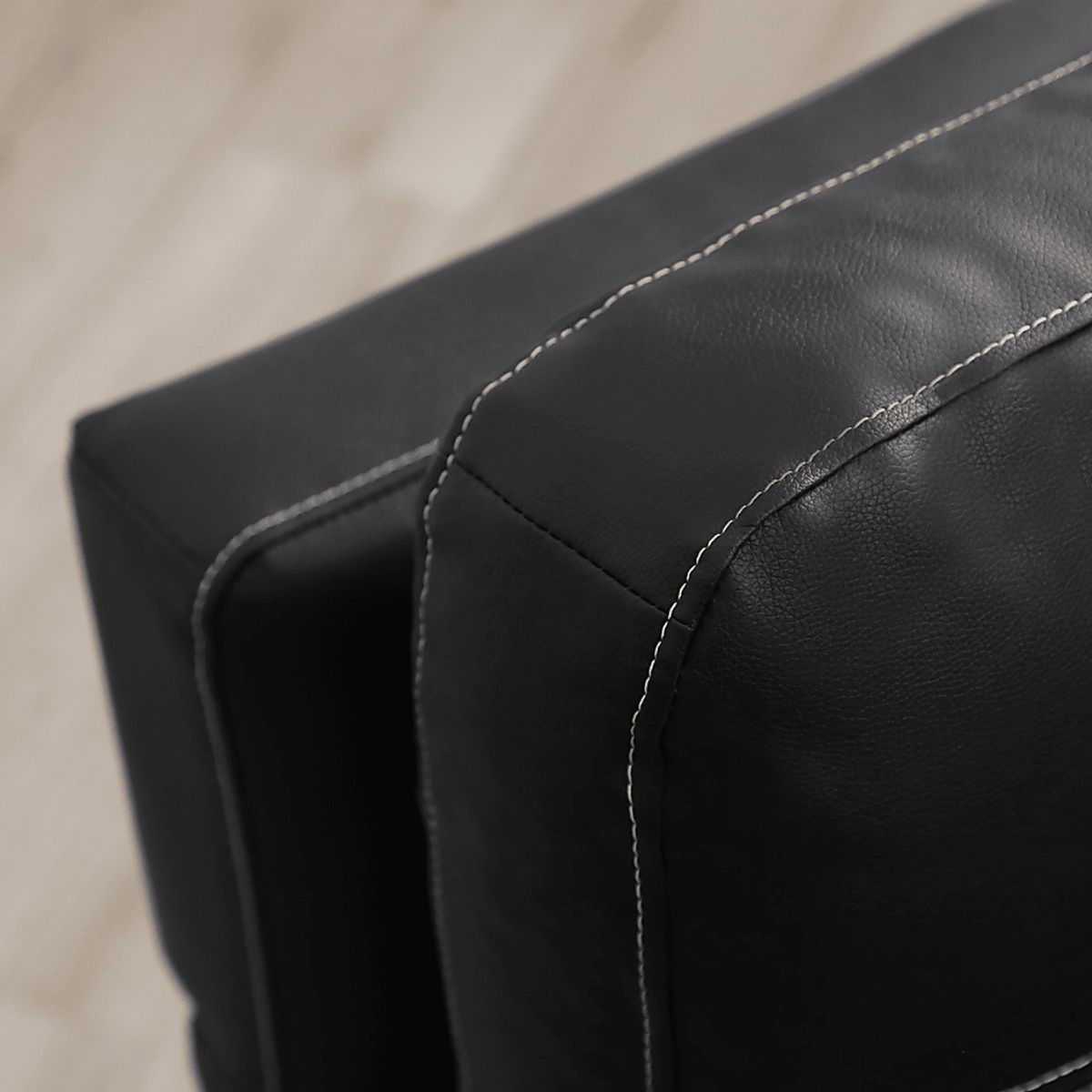 Cheever Black Polyurethane Fabric Futon Chair | Rooms to Go
