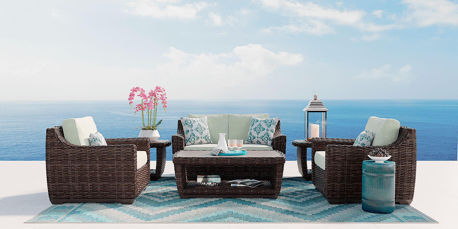 Cindy Crawford Montecello Wicker Rollo Mist Outdoor Loveseat | Rooms to Go