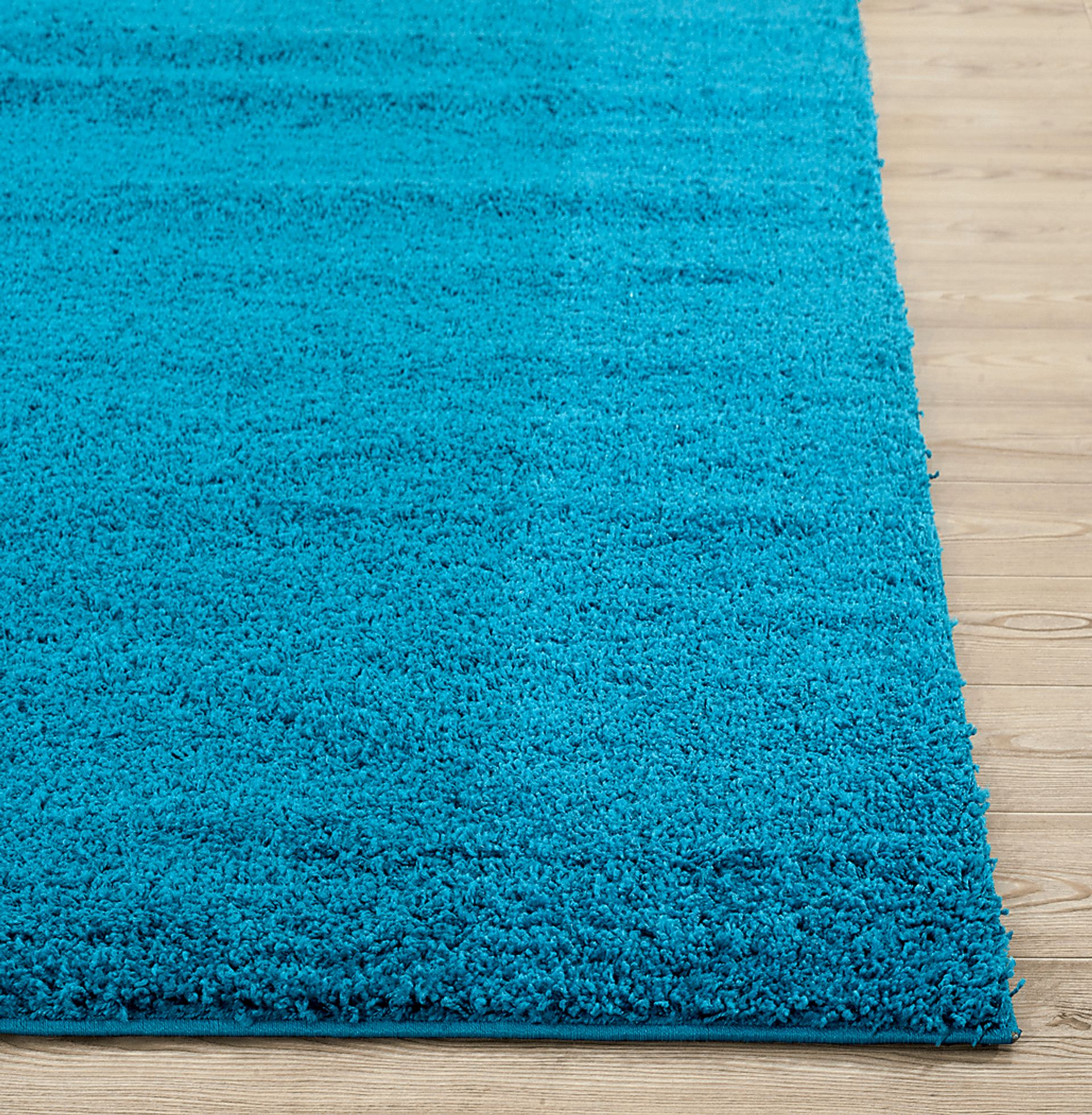 Cinthia Turquoise Blue Rug | Rooms to Go