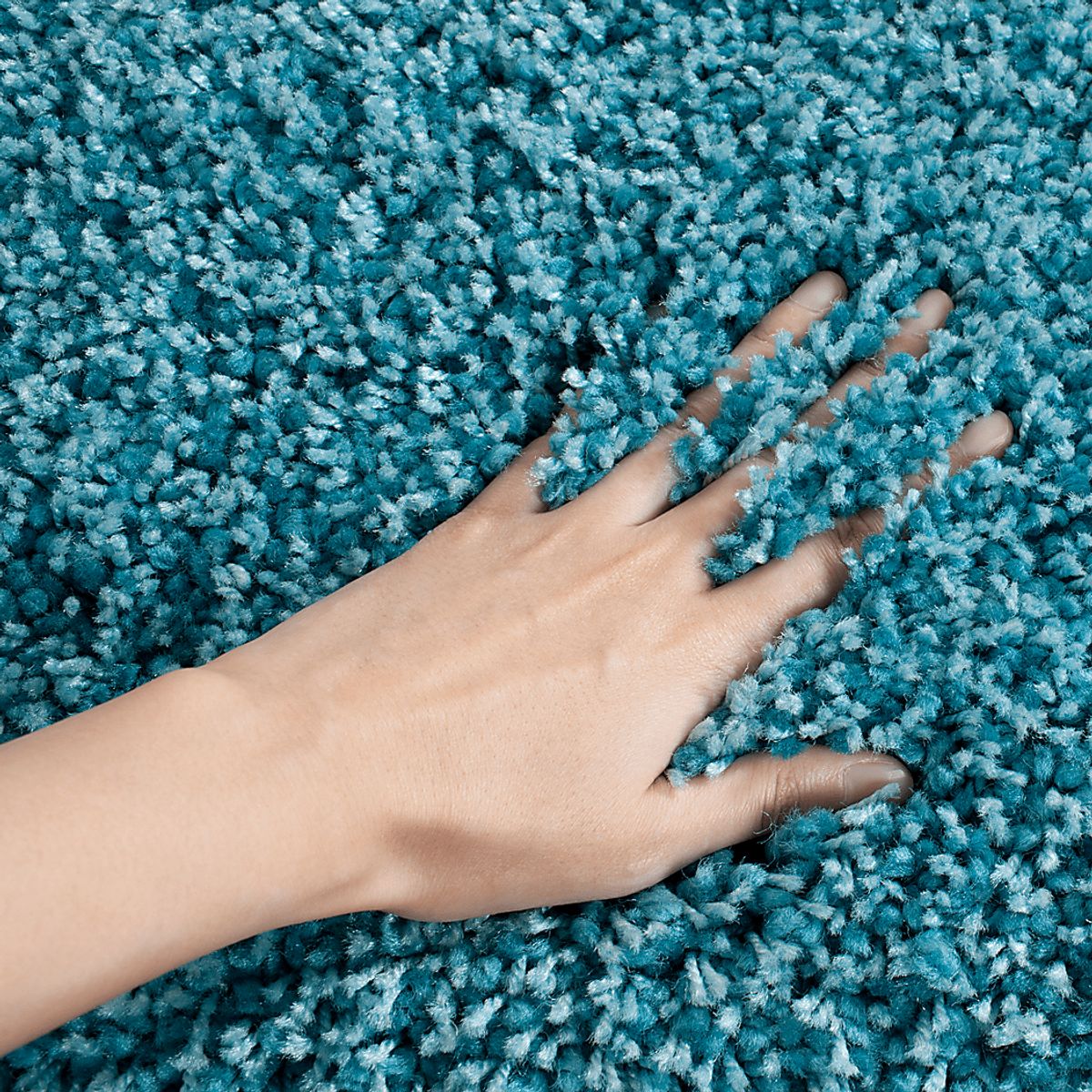 Cleona Turquoise Blue Polypropylene Fabric Rug | Rooms to Go