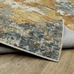 Clouston Gold Yellow Polyester Fabric Rug | Rooms to Go