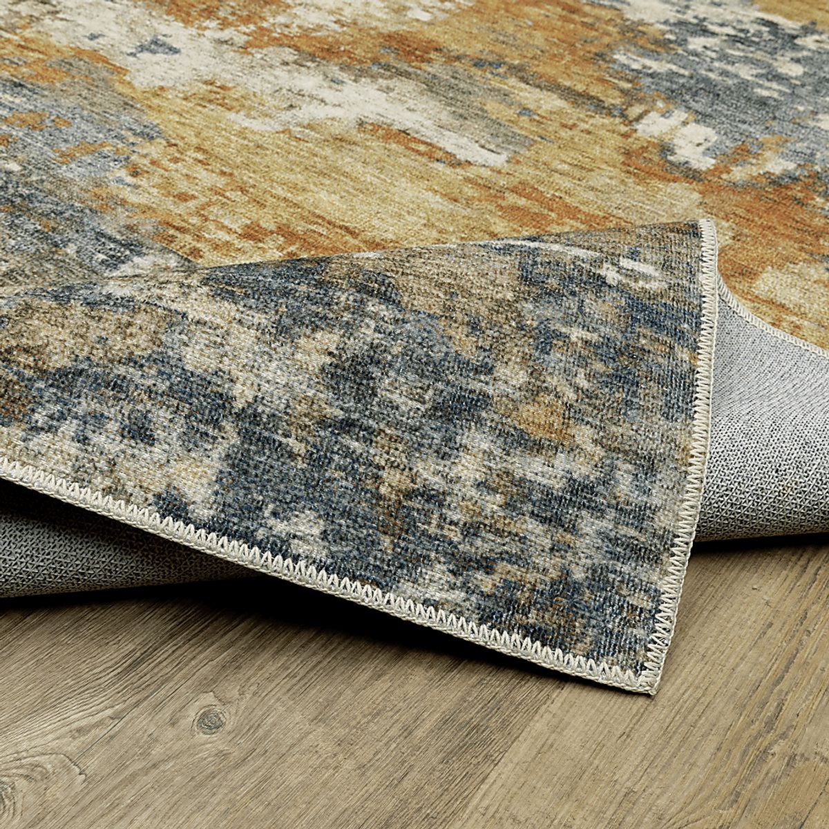 Clouston Gold Yellow Polyester Fabric Rug | Rooms to Go