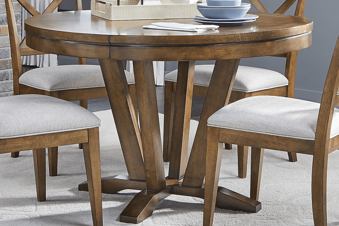 Clyde Circle Brown Dark Wood Round Dining Table - Rooms To Go