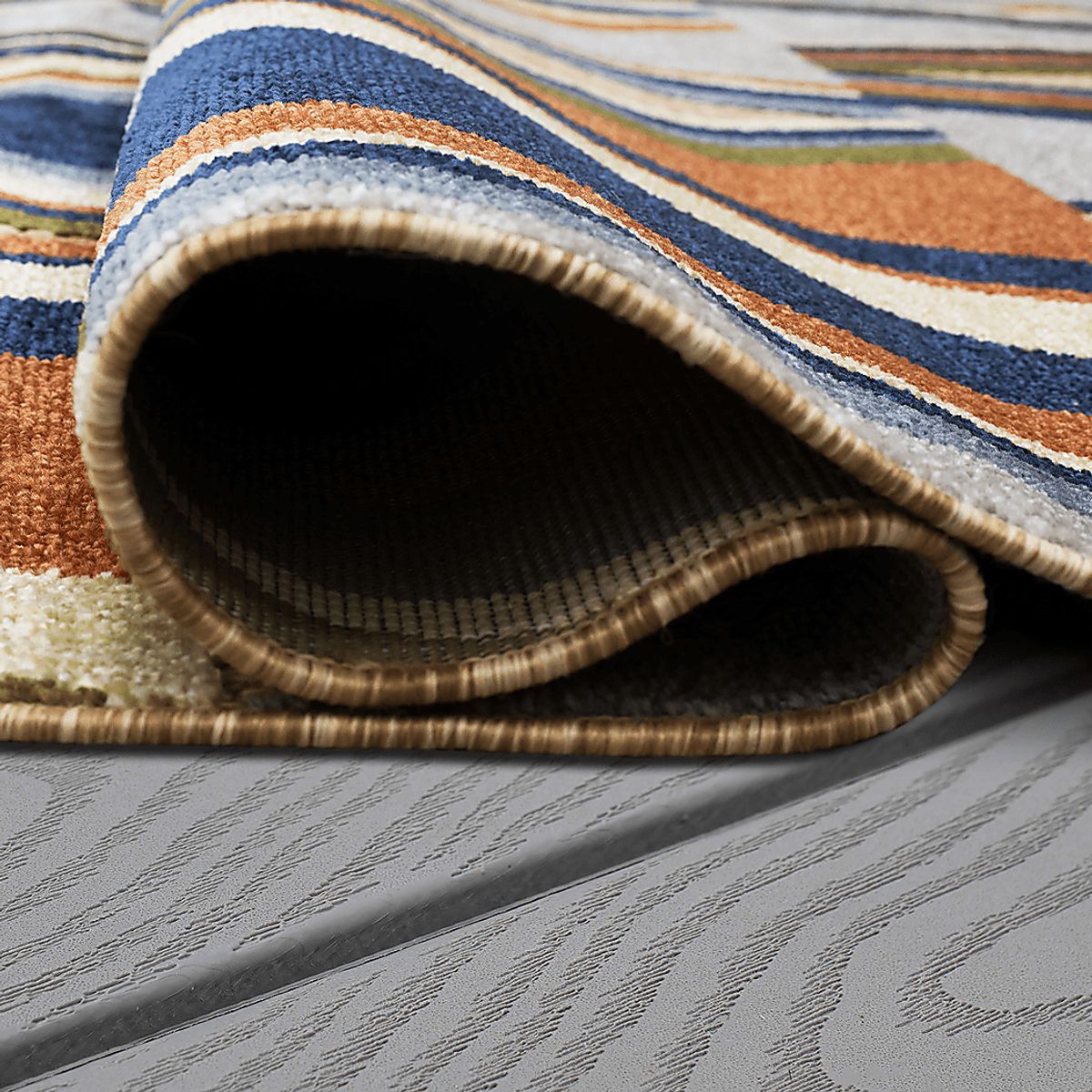 Cudsay Coast Beige,Blue,Rust Beige,Blue,Red Outdoor Rugs | Rooms to Go