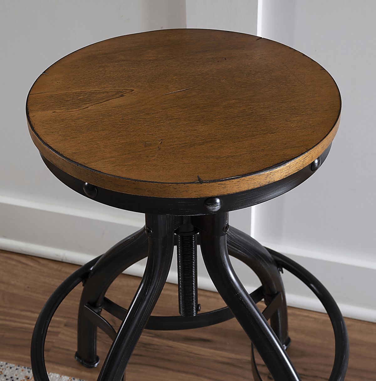 Deleyla Brown,Metal Dark Wood,Metal Brown Adjustable Barstool | Rooms to Go