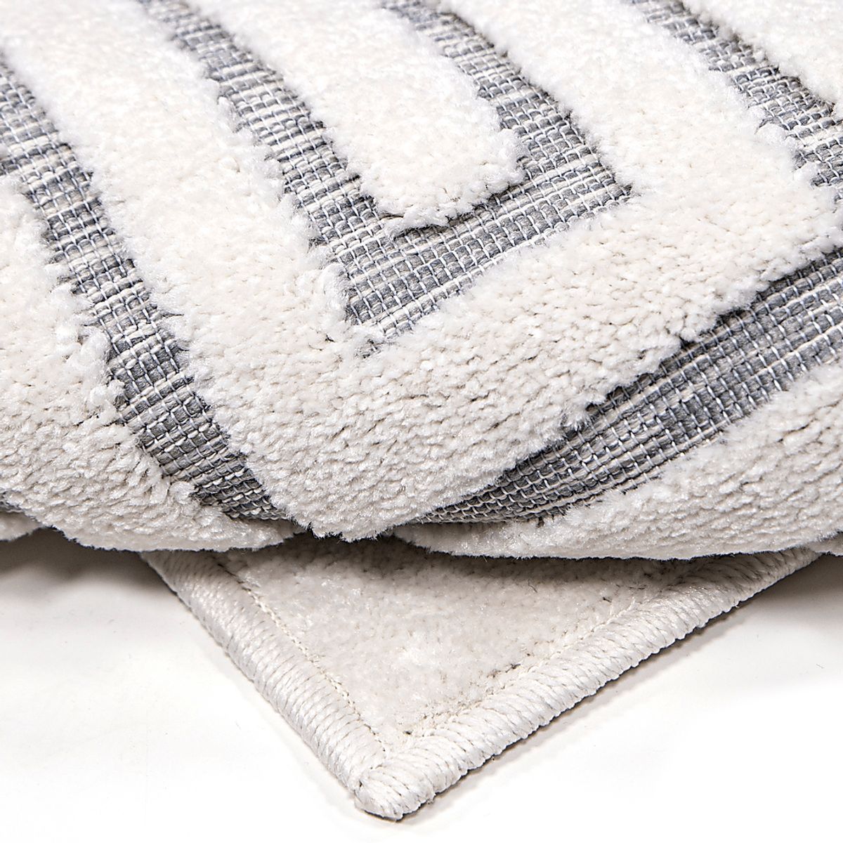 Denbigh White Polypropylene Fabric Rug | Rooms to Go