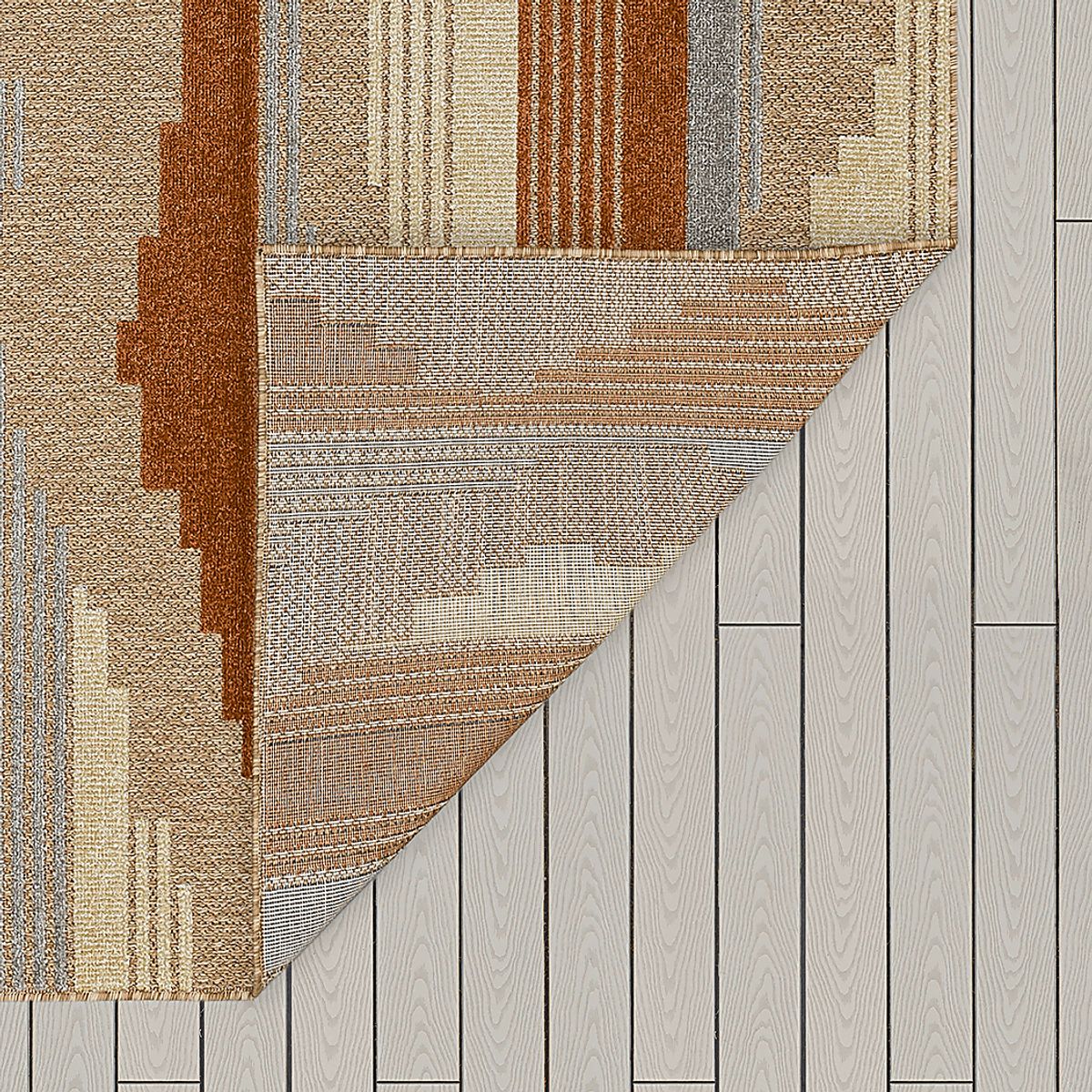 Derose Bay Rust Red Outdoor Rugs | Rooms to Go