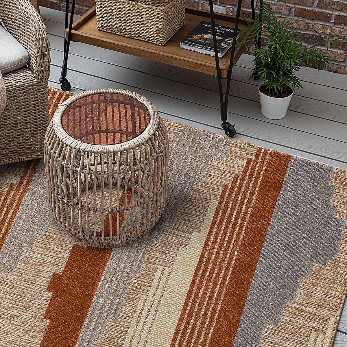 Derose Bay Rust Red Outdoor Rugs | Rooms to Go