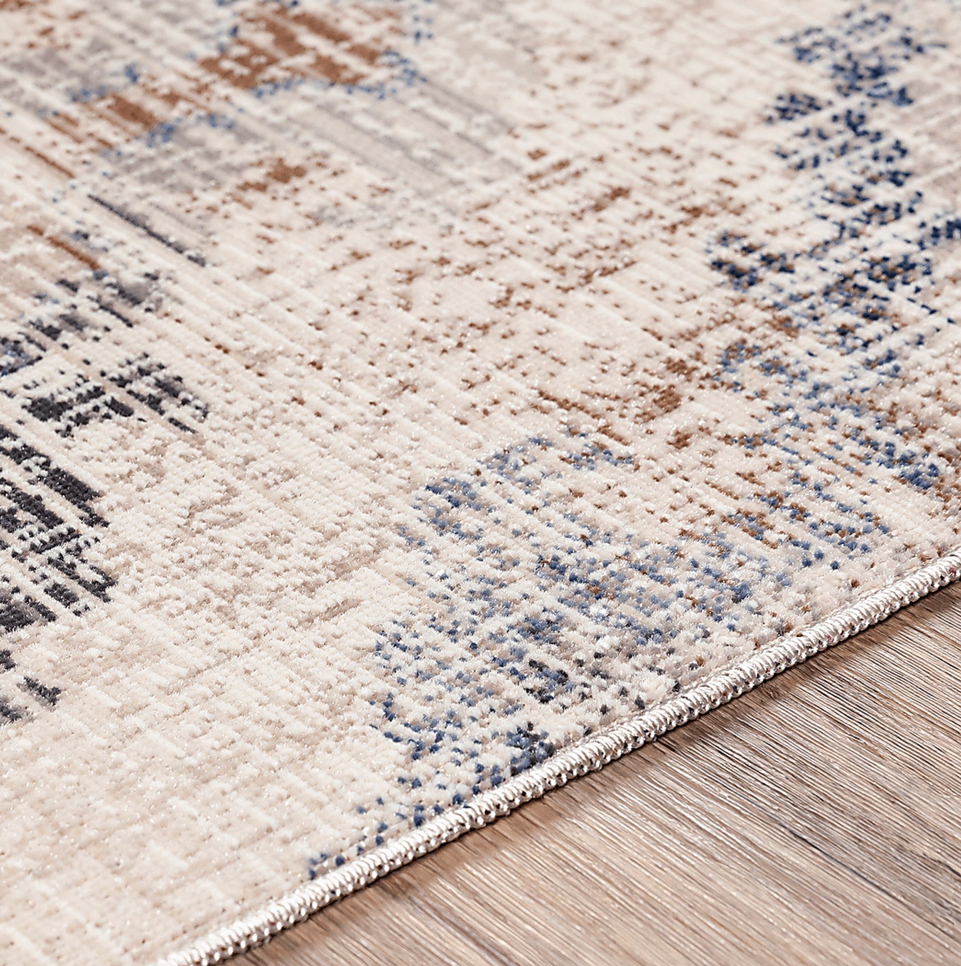 Devonte Taupe Beige Rug | Rooms to Go
