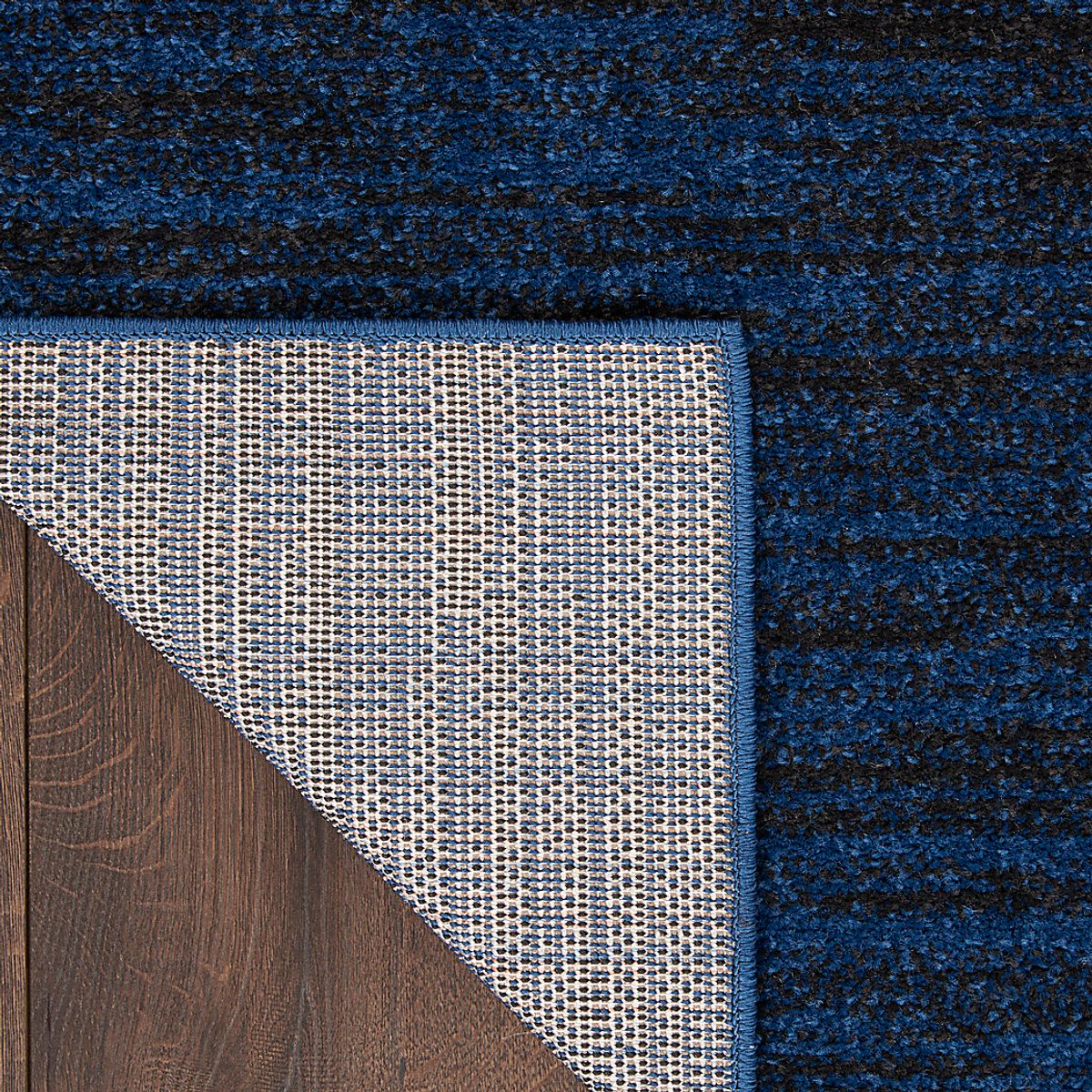Easthagen Midnight Blue Rugs | Rooms to Go