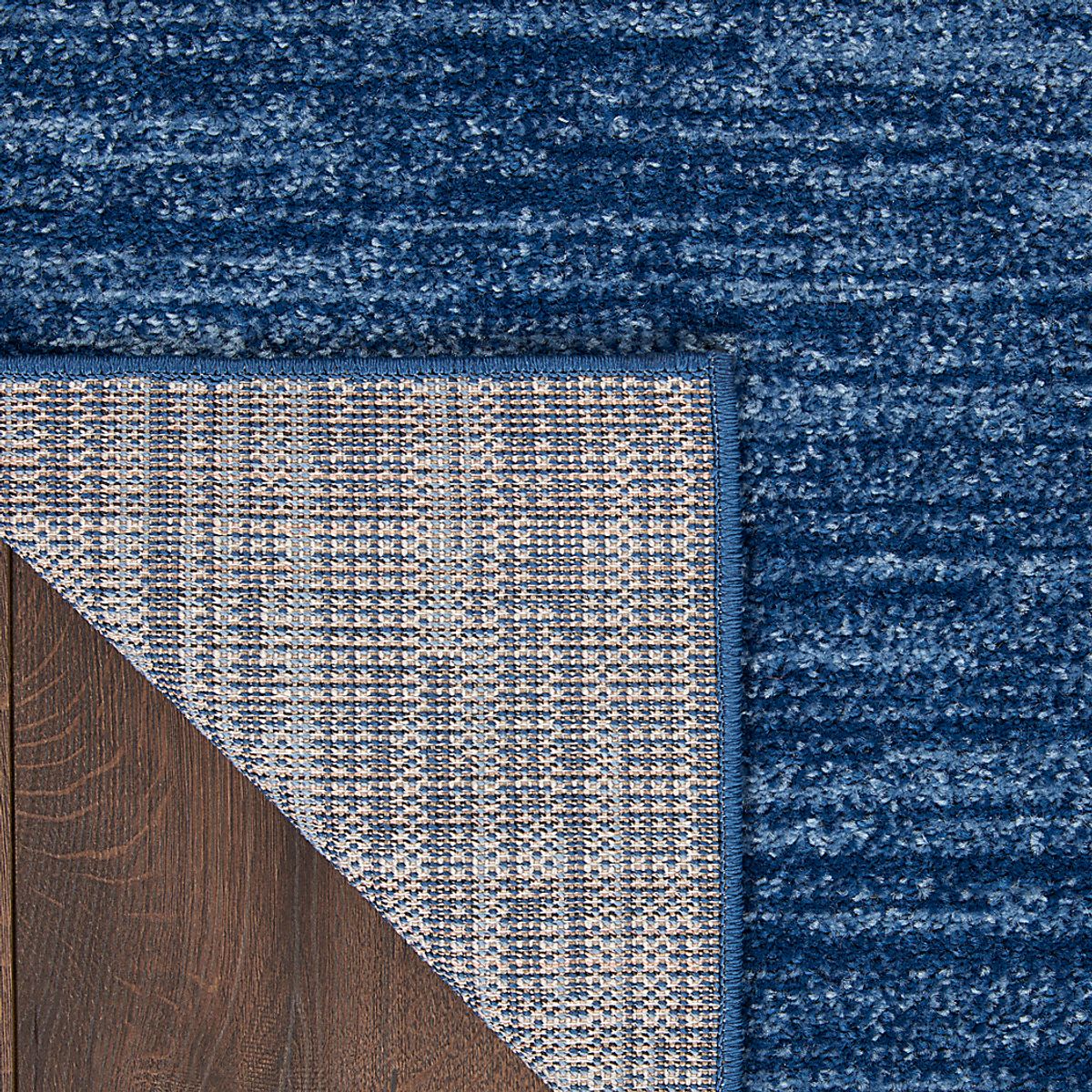 Easthagen Navy Blue Rugs | Rooms to Go