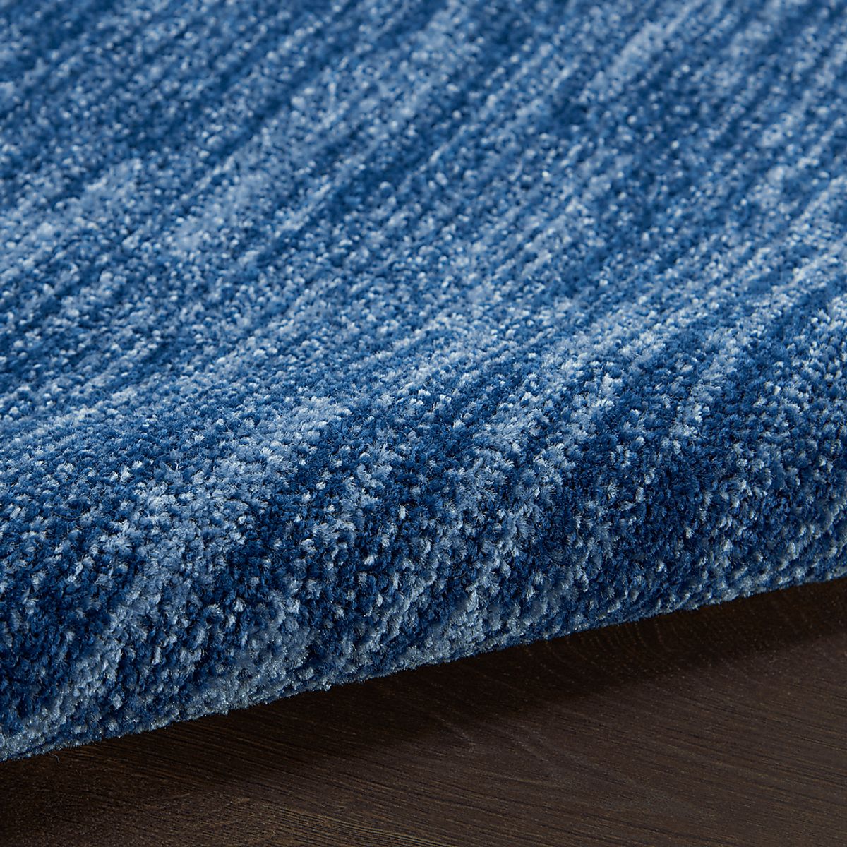Easthagen Navy Blue Rugs | Rooms to Go