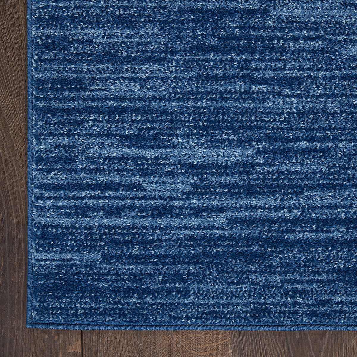 Easthagen Navy Blue Rugs | Rooms to Go