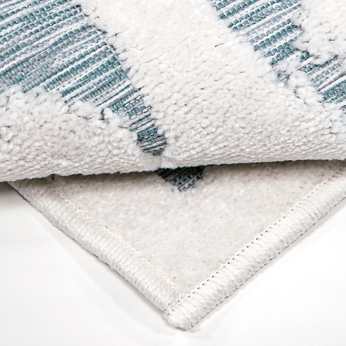 Edingale White Polypropylene Fabric Rug | Rooms to Go