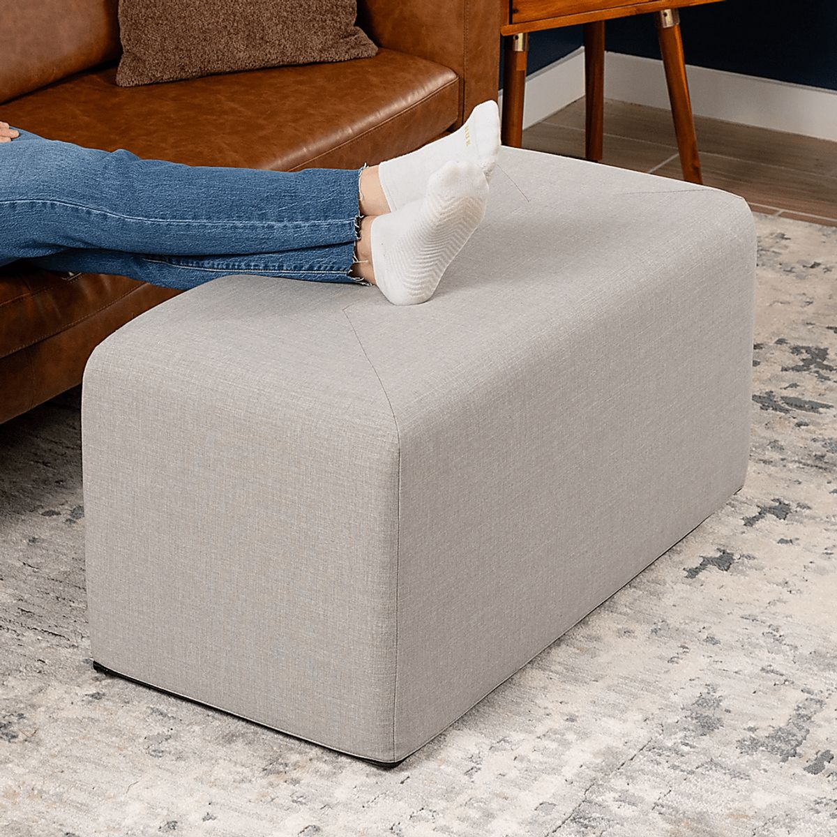 Edunci Gray Polyester Fabric Rectangular Ottoman | Rooms to Go