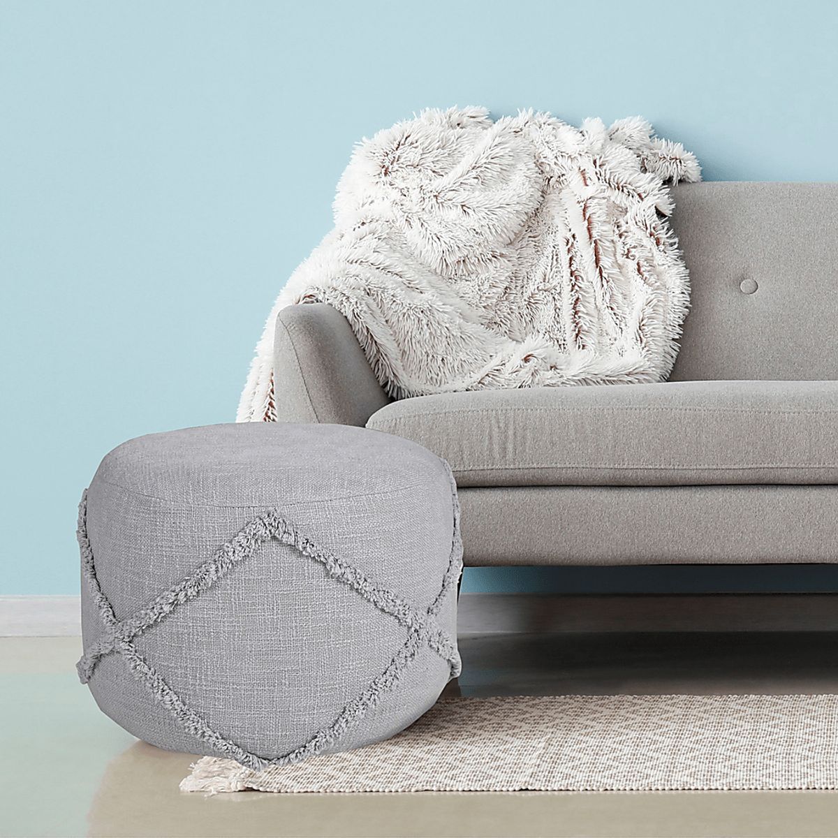 Elizeno I Gray Cotton Fabric Pouf | Rooms to Go