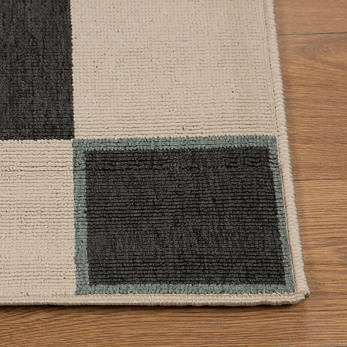 Peachco Beige,Black Outdoor Rugs | Rooms to Go