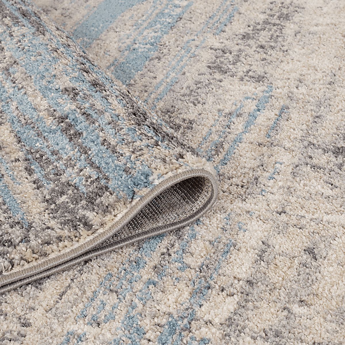 Fasil Blue Rugs | Rooms to Go