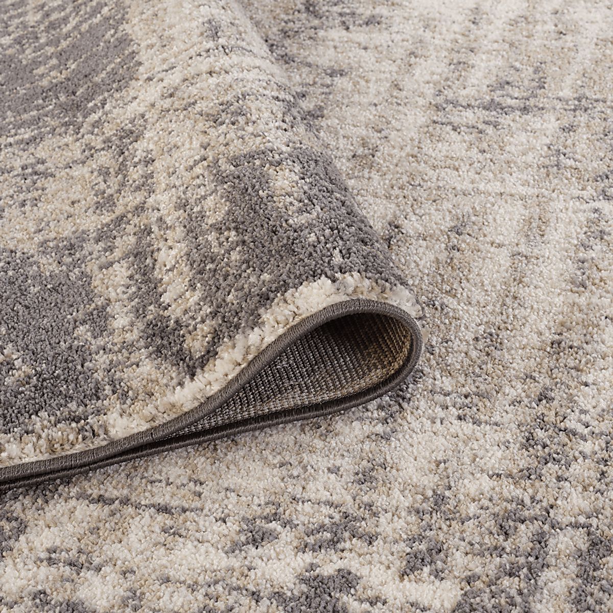 Fasil Charcoal Black,Gray Rugs | Rooms to Go