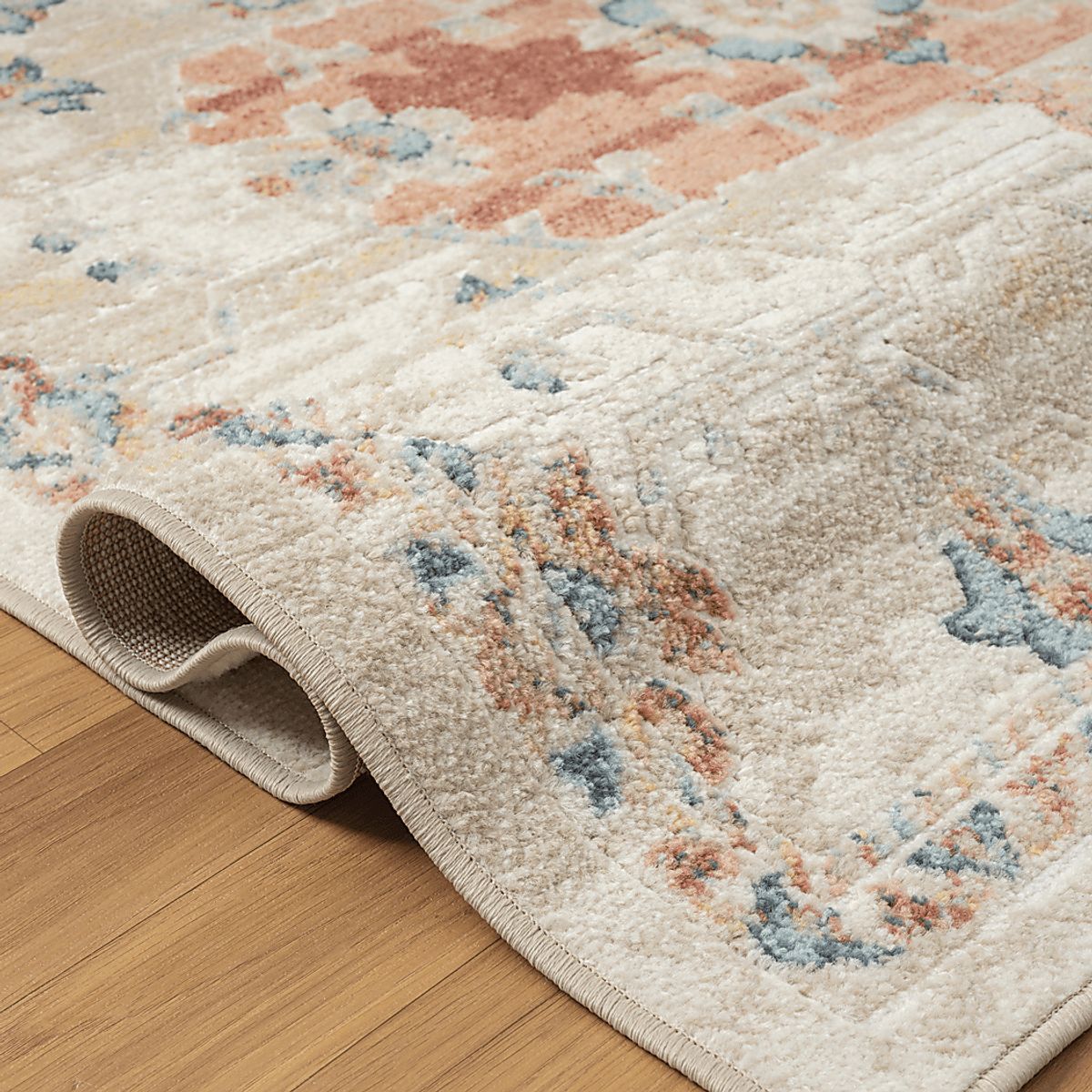 Hatem Ivory,Rust Beige,Red Rugs | Rooms to Go