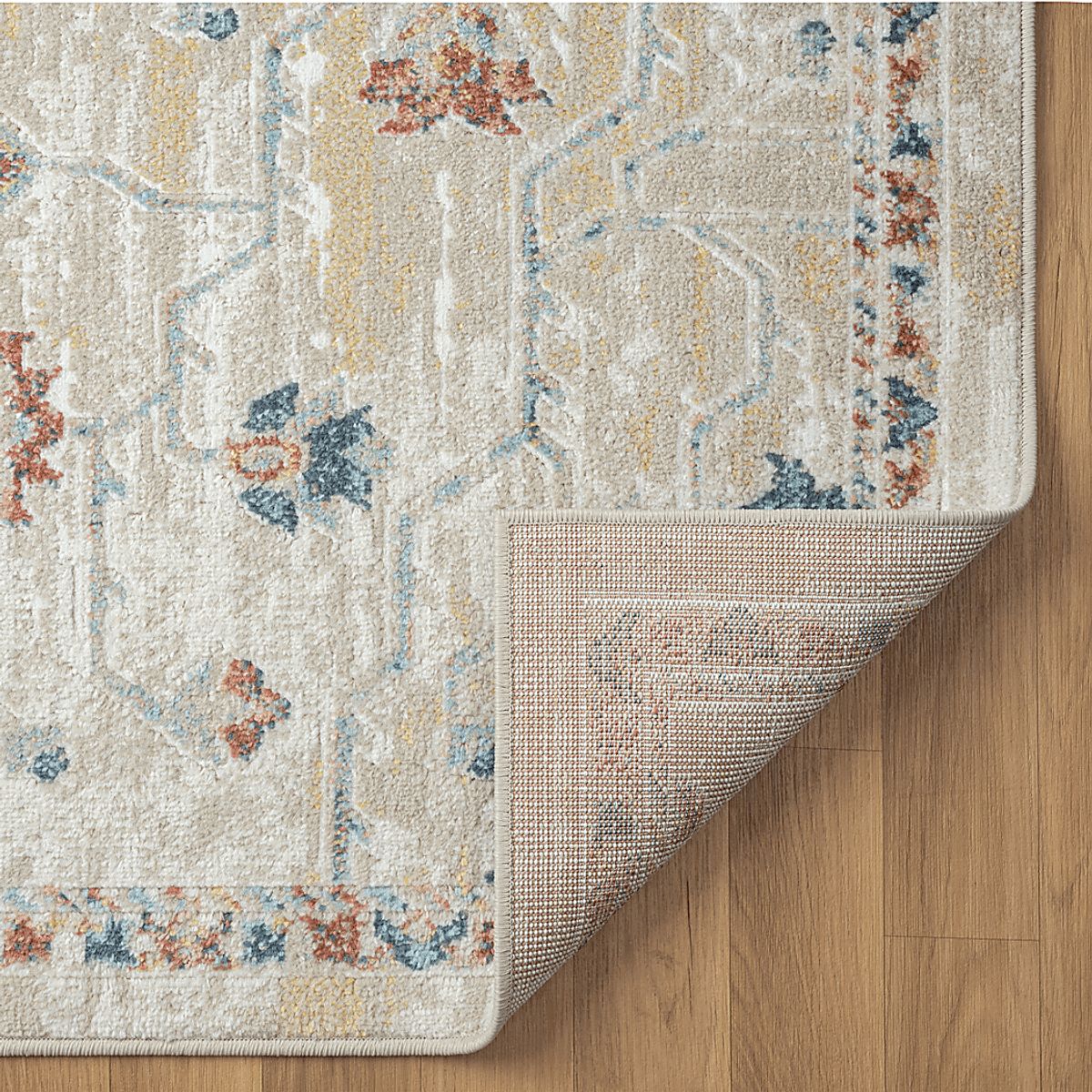 Hatem Ivory,Rust Beige,Red Rugs | Rooms to Go