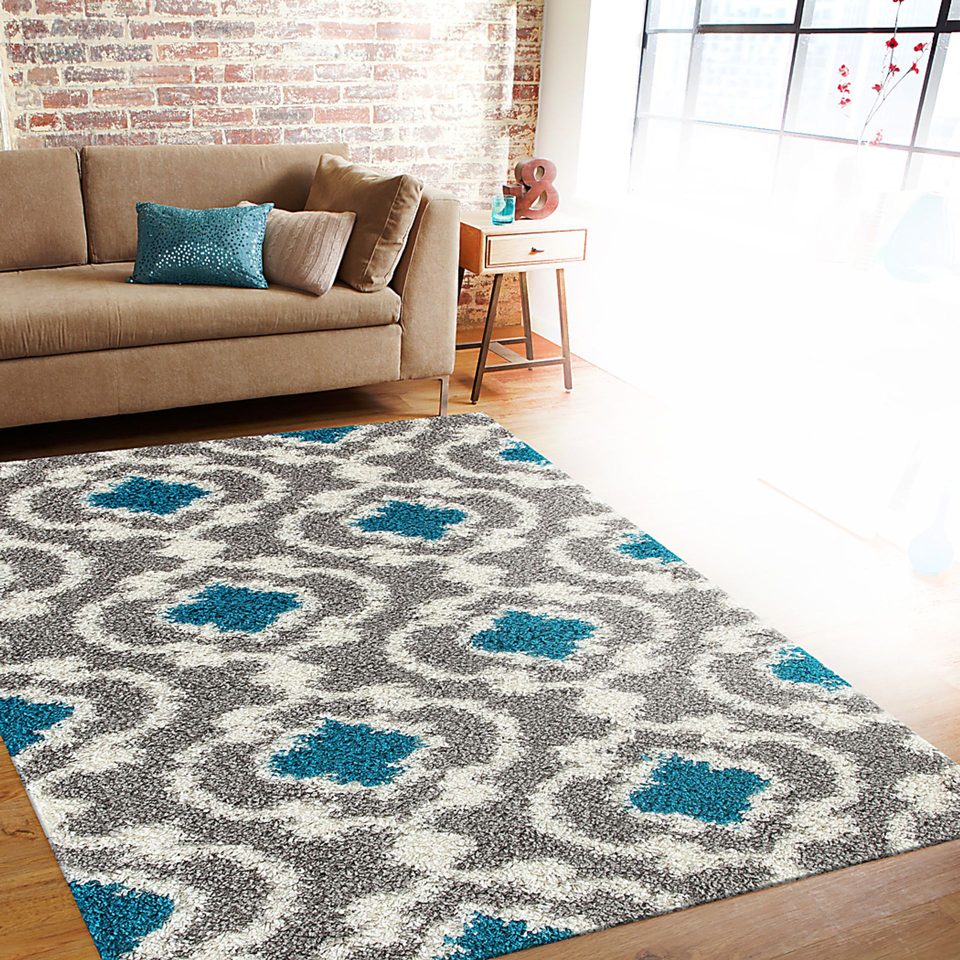 Irenee Turquoise Blue Rug | Rooms to Go