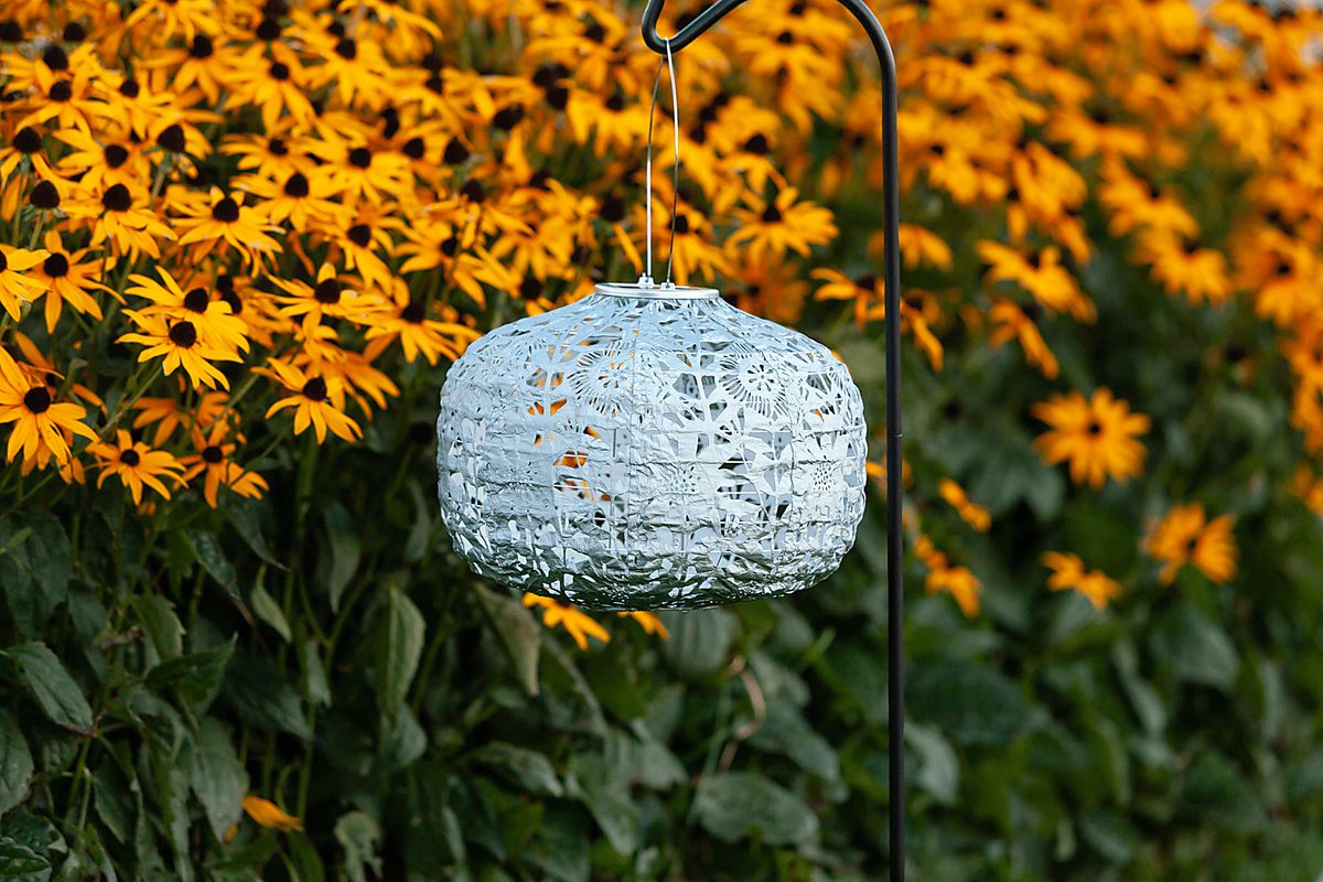 Irian Island Sage Green Outdoor Lantern | Rooms to Go