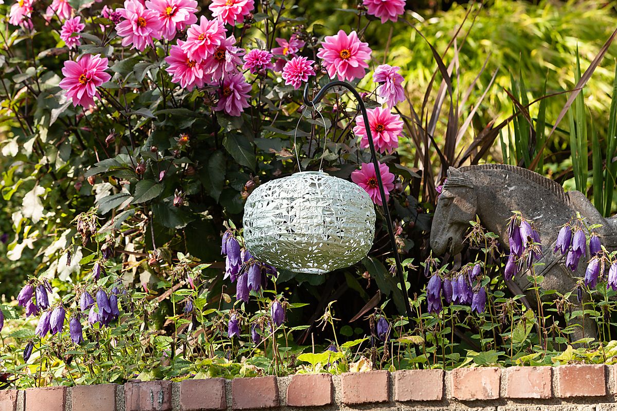 Irian Island Sage Green Outdoor Lantern | Rooms to Go