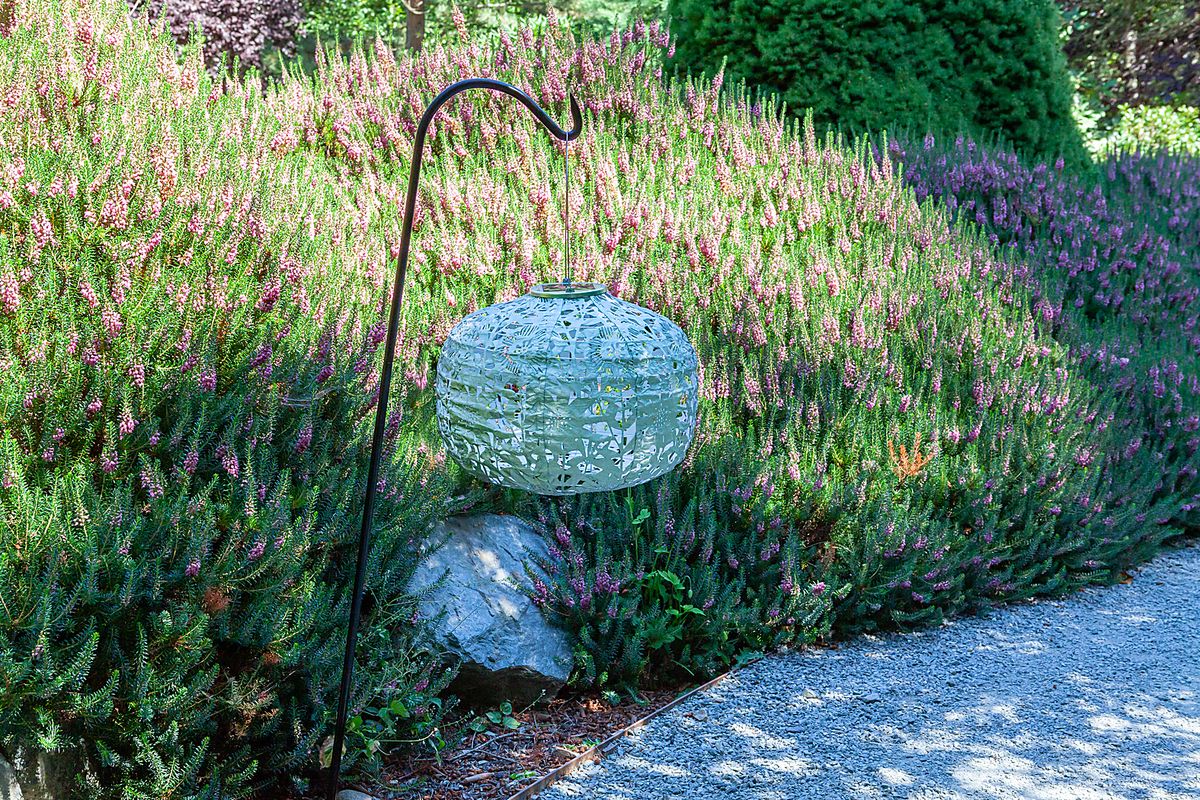 Irian Island Sage Green Outdoor Lantern | Rooms to Go