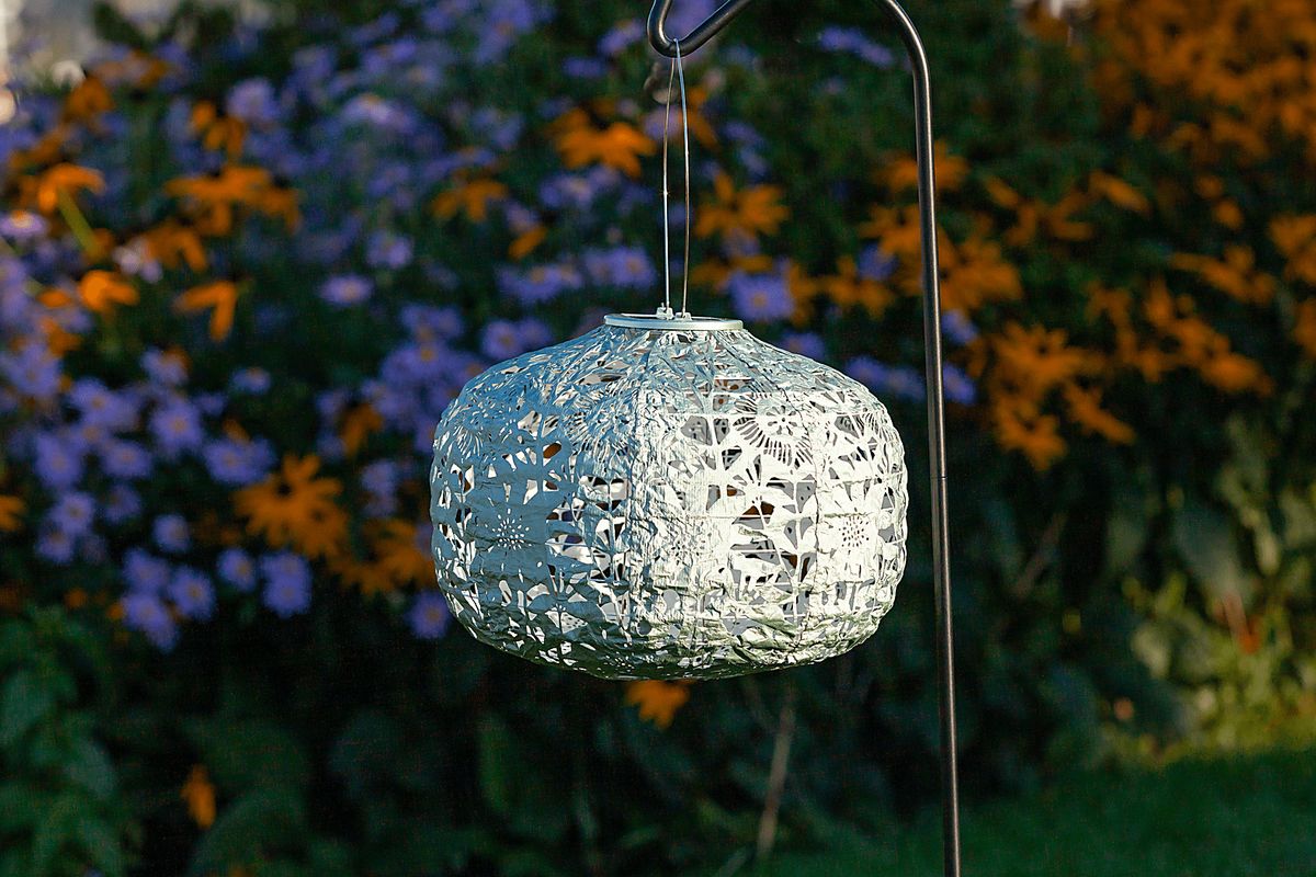 Irian Island Sage Green Outdoor Lantern | Rooms to Go