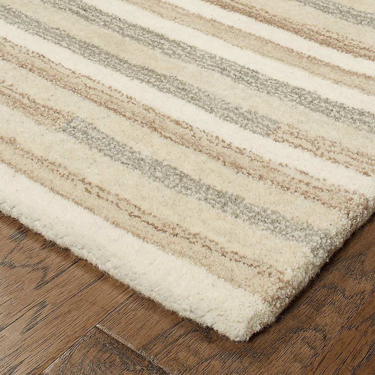 Benison Beige Rug | Rooms to Go