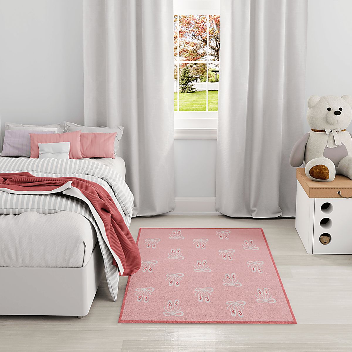 Demure Bow Pink Rugs | Rooms to Go