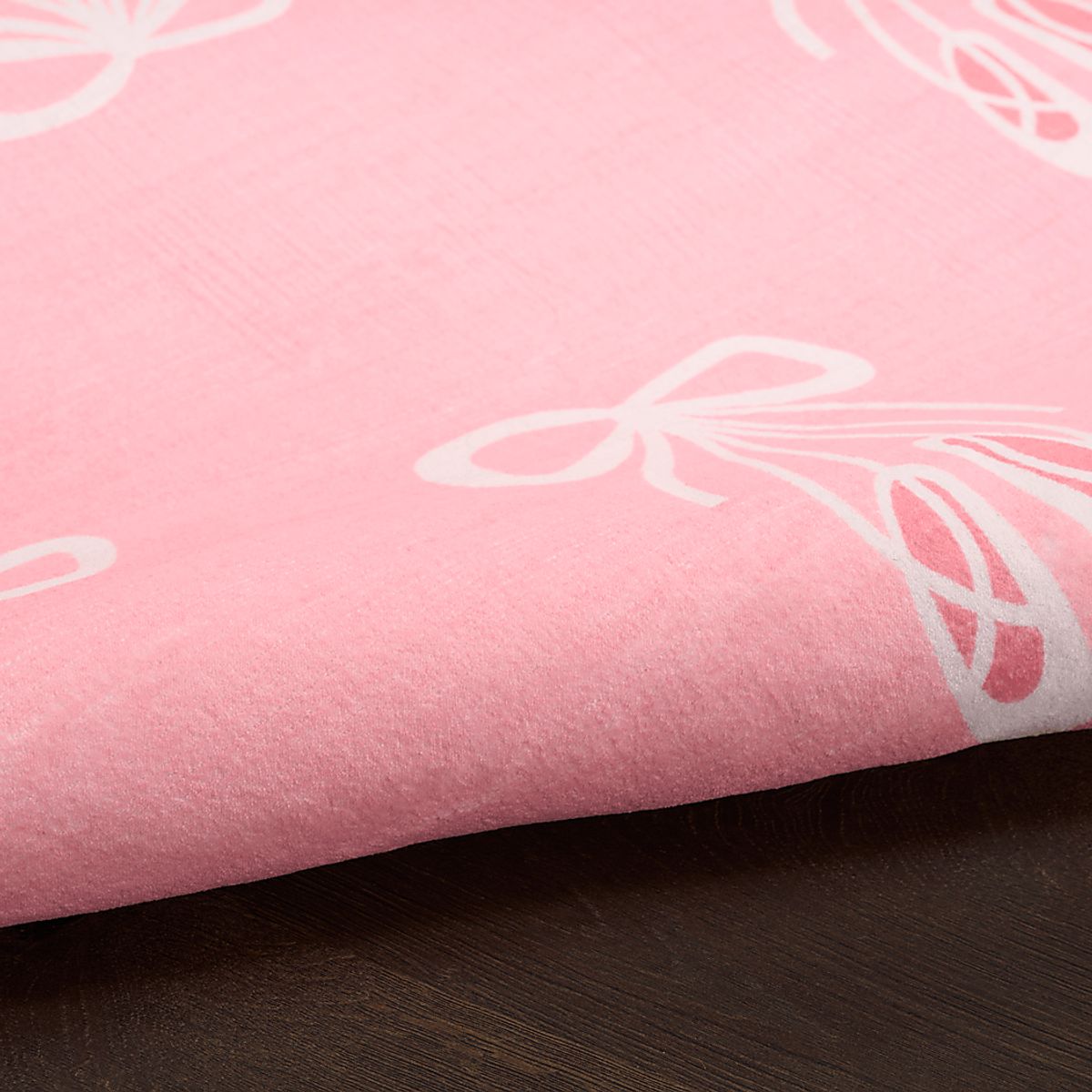 Demure Bow Pink Rugs | Rooms to Go