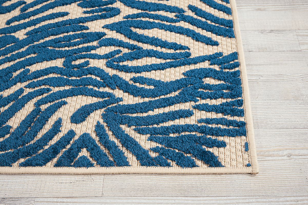 Festive Coral Blue Polypropylene Fabric Rug | Rooms to Go