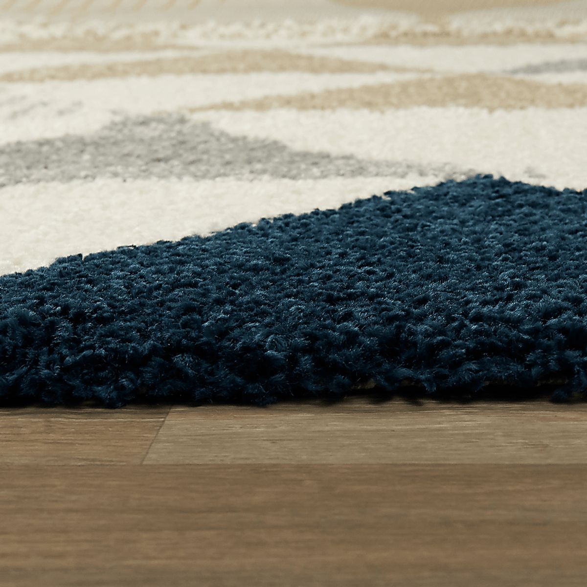 Modern Triangles Cream Beige Polypropylene Fabric Rug | Rooms to Go