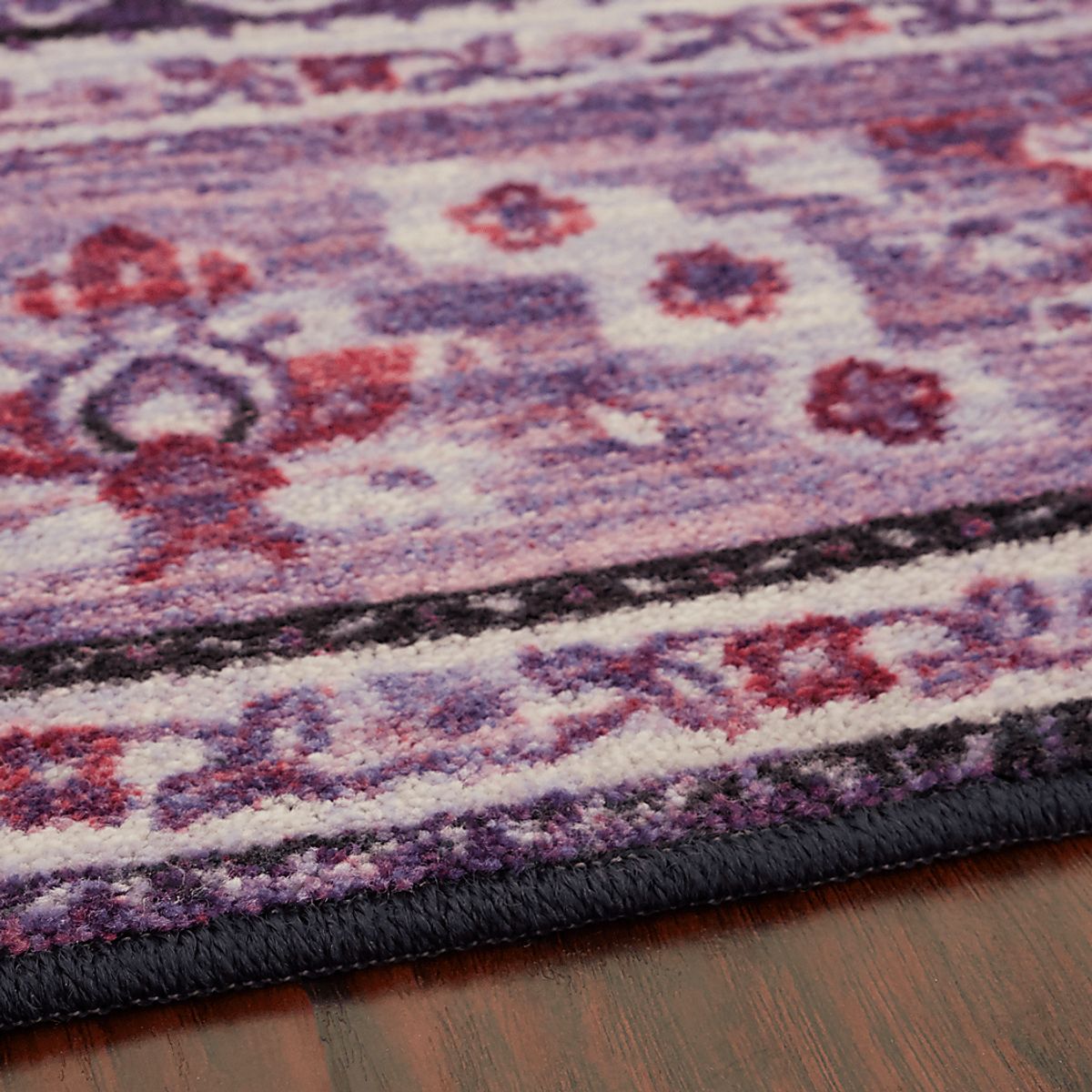 Ravenwell Purple Red Rugs | Rooms to Go