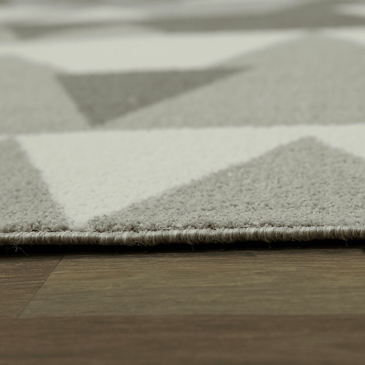 Wild Angles Gray Polypropylene Fabric Rug | Rooms to Go