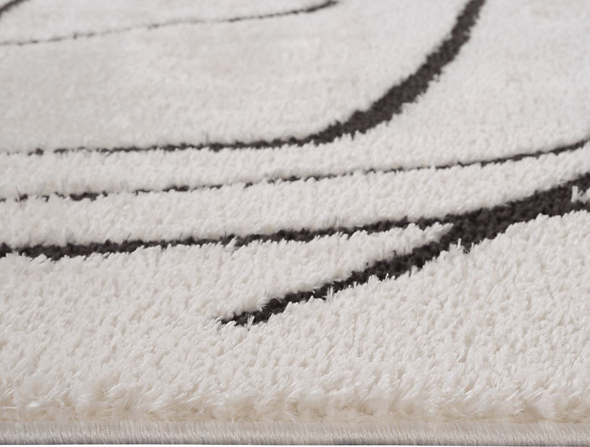 Kulari Black,Ivory Beige,Black Rugs | Rooms to Go