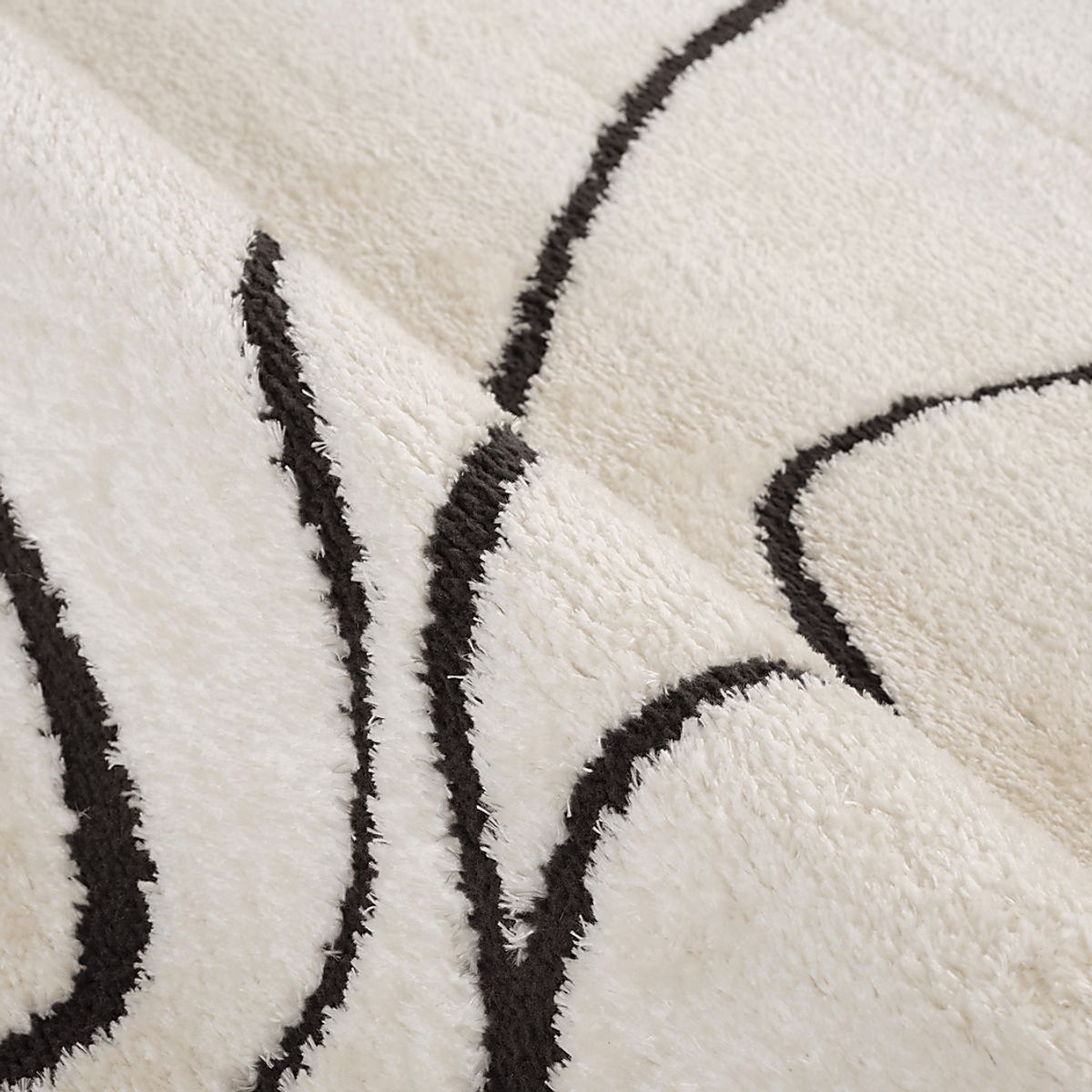 Kulari Black,Ivory Beige,Black Rugs | Rooms to Go